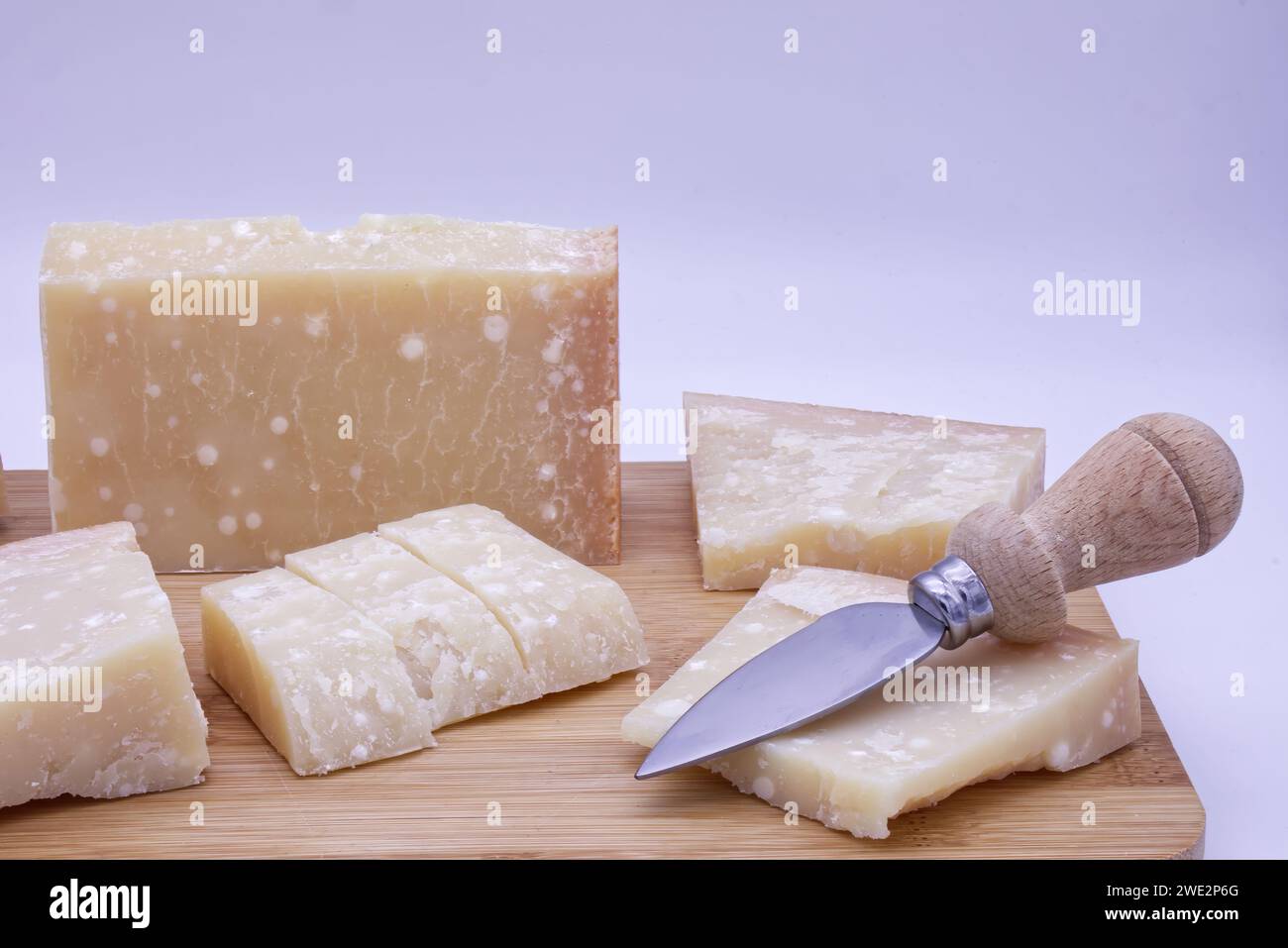 Italian Parmigiano Reggiano cheese isolated on white background ...