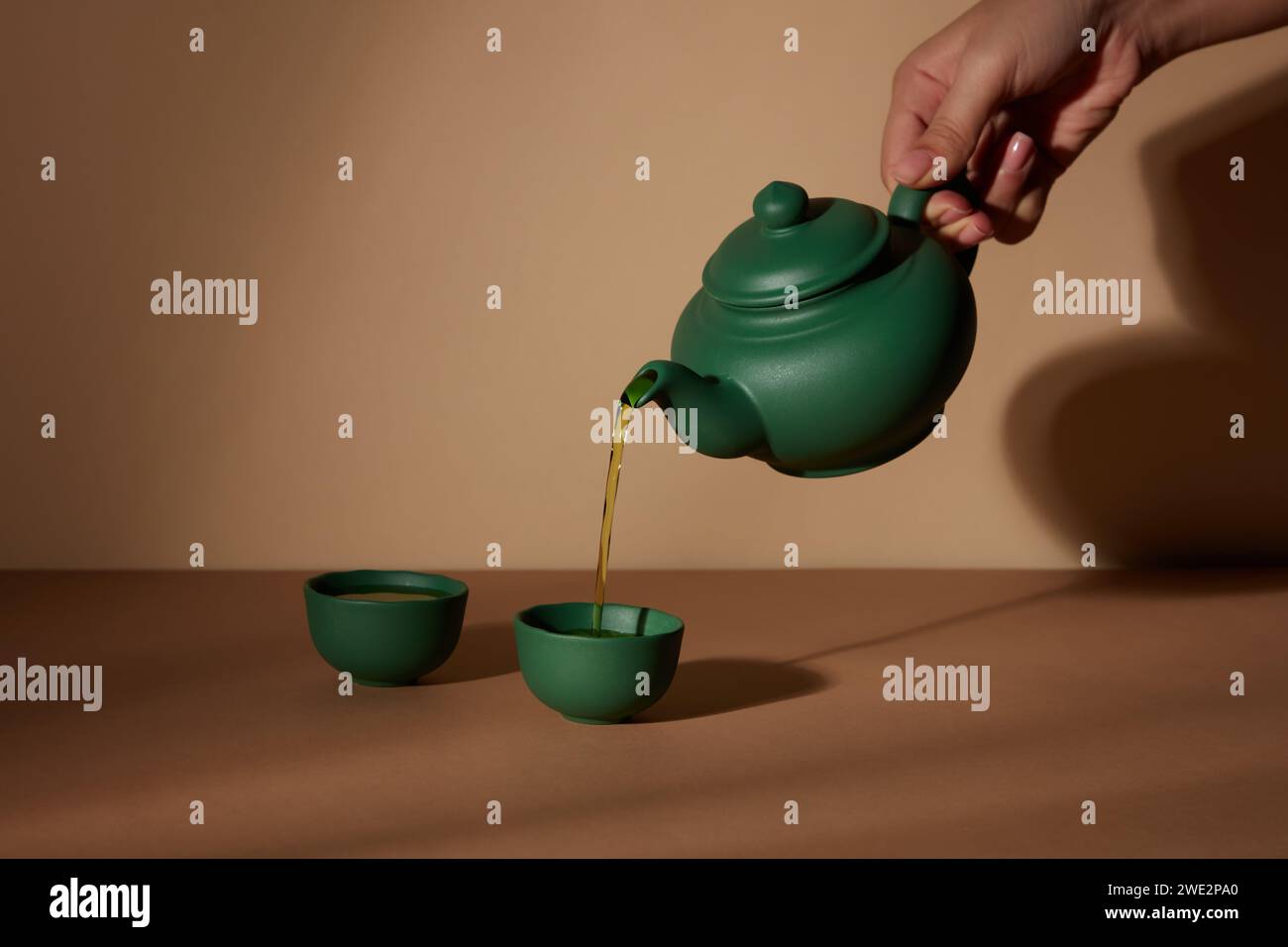 Minimal abstract background with set of teapot and cup. Against the ...