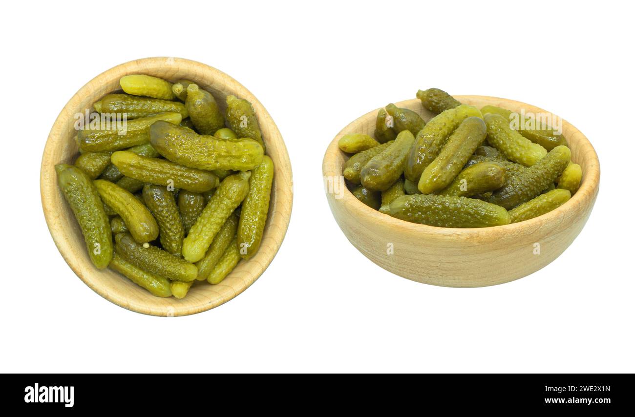 Bowl of tasty canned whole green cornichons isolated on a white ...