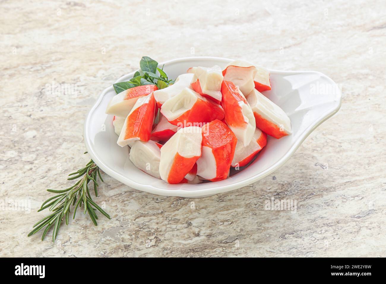 Crab meat surimi in the bowl appetizer Stock Photo - Alamy