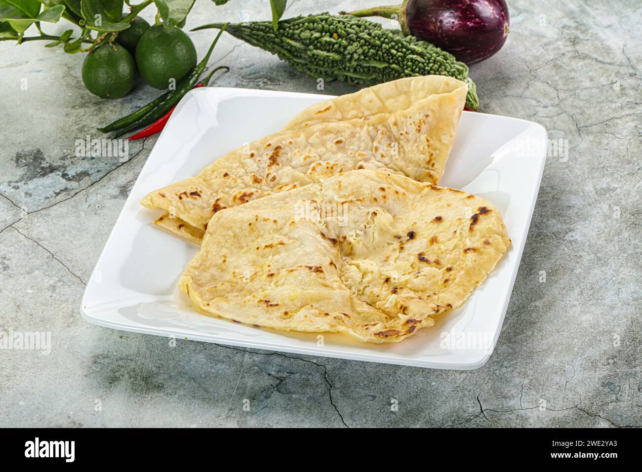 Indian cuisine tandori bread - naan with cheese Stock Photo - Alamy