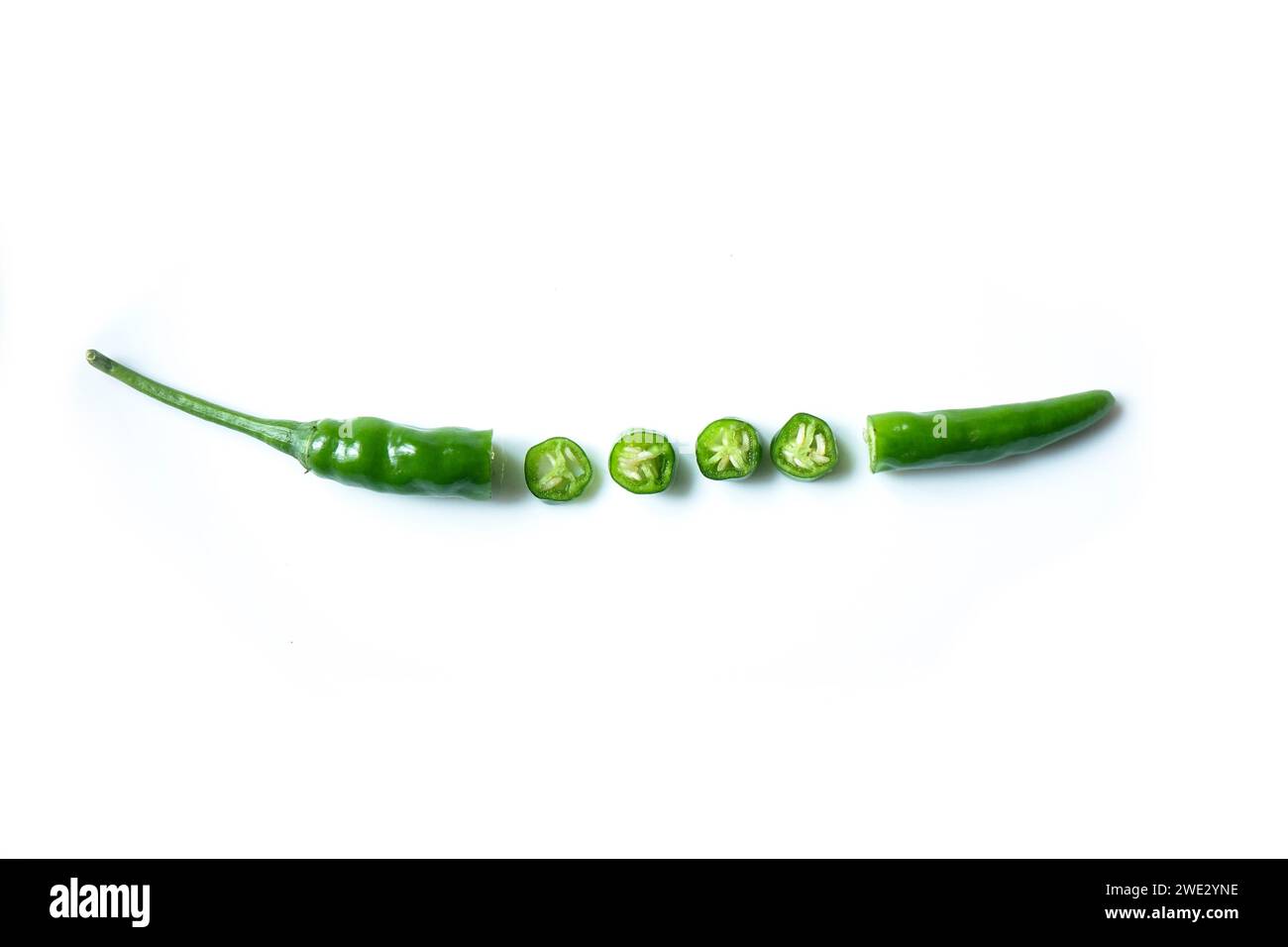 Green chilli sliced Cut Out Stock Images & Pictures - Alamy