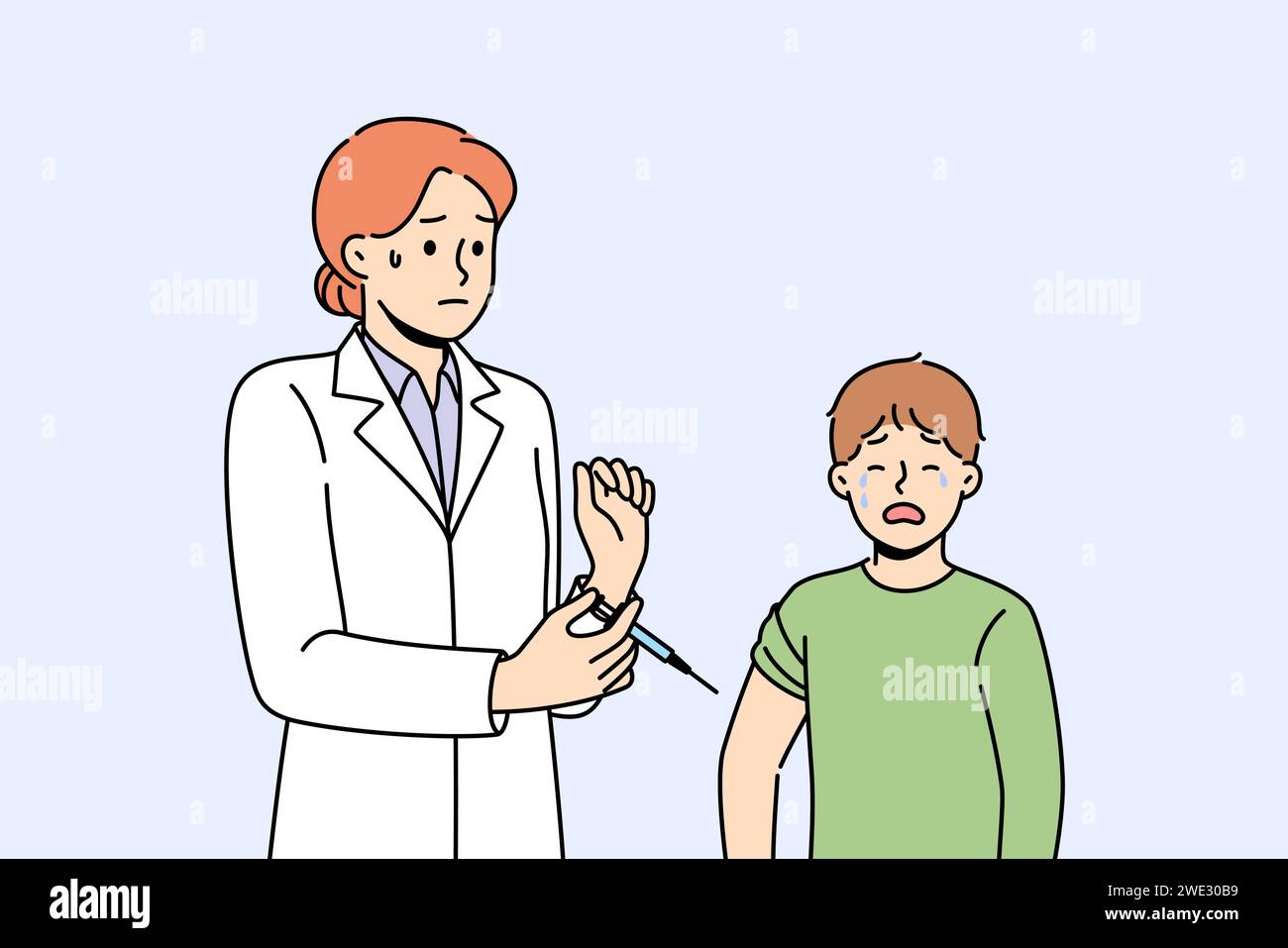 Boy suffers vaccine phobia and is crying standing near woman doctor ...