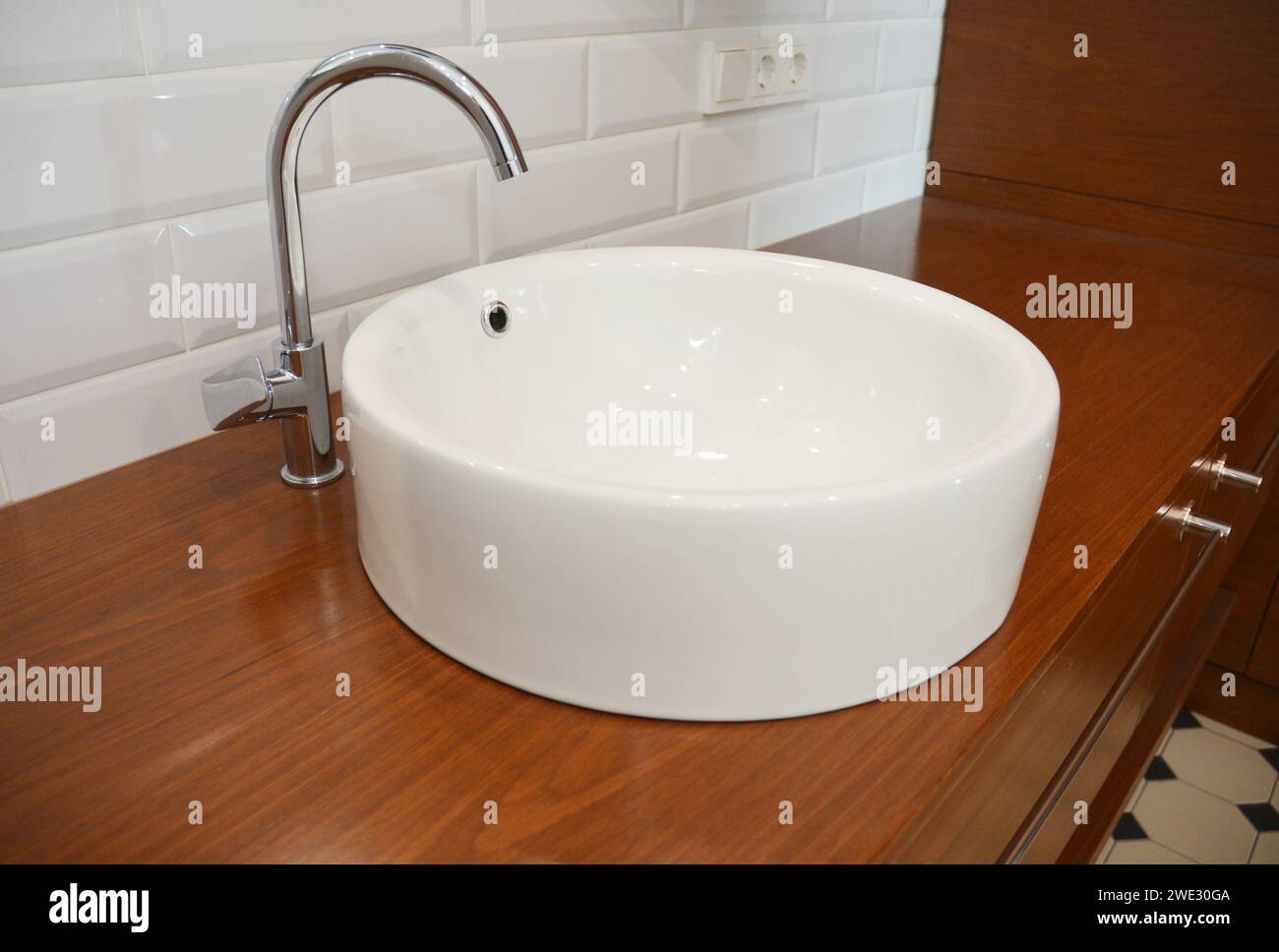 Luxury bath room chrome water tap with ceramic white sink Stock Photo ...