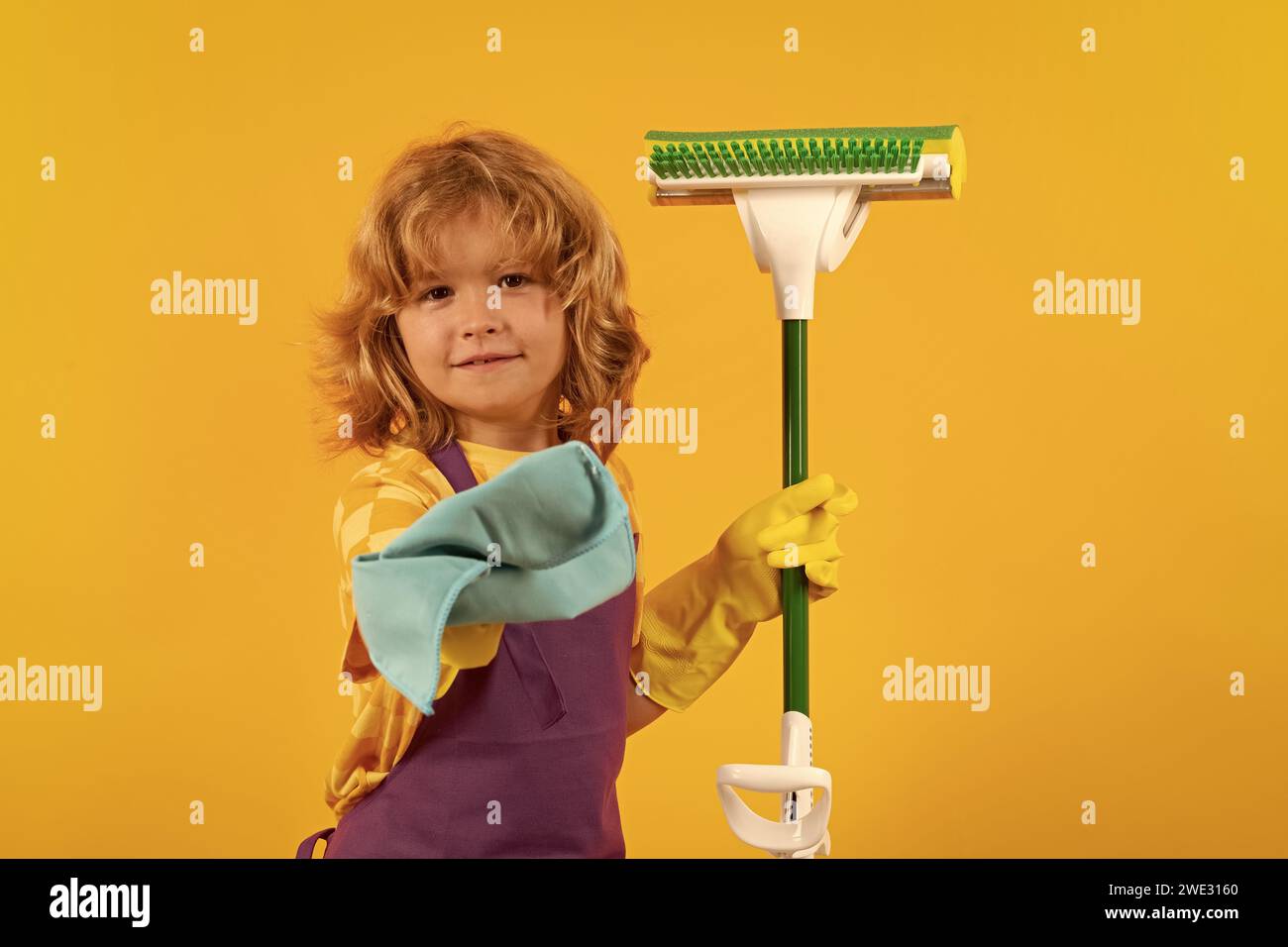 Child doing housework. Children helping with housekeeping, cleaning the ...