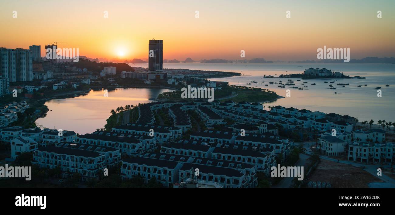 Sunrise at Ha Long Bay with view over the landscaped islands with ...