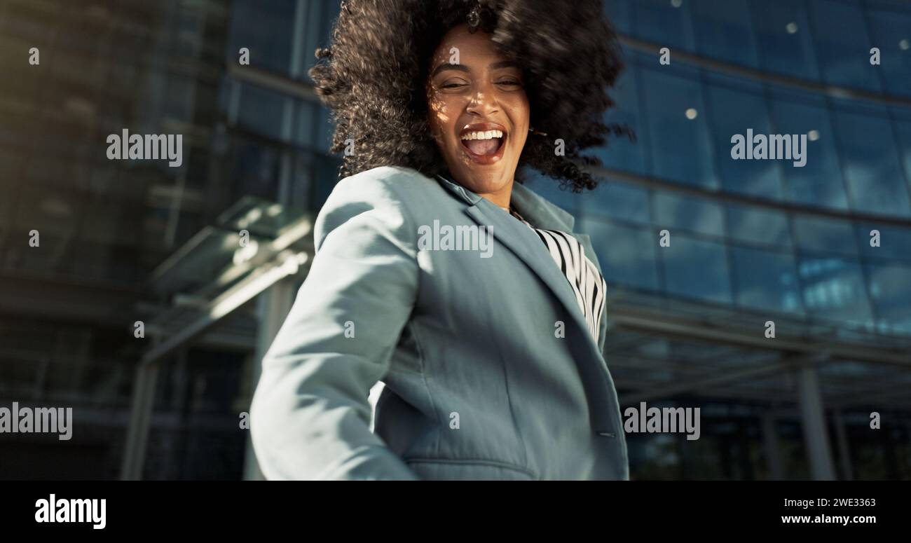 Happy, dance and business woman in the city with job promotion ...