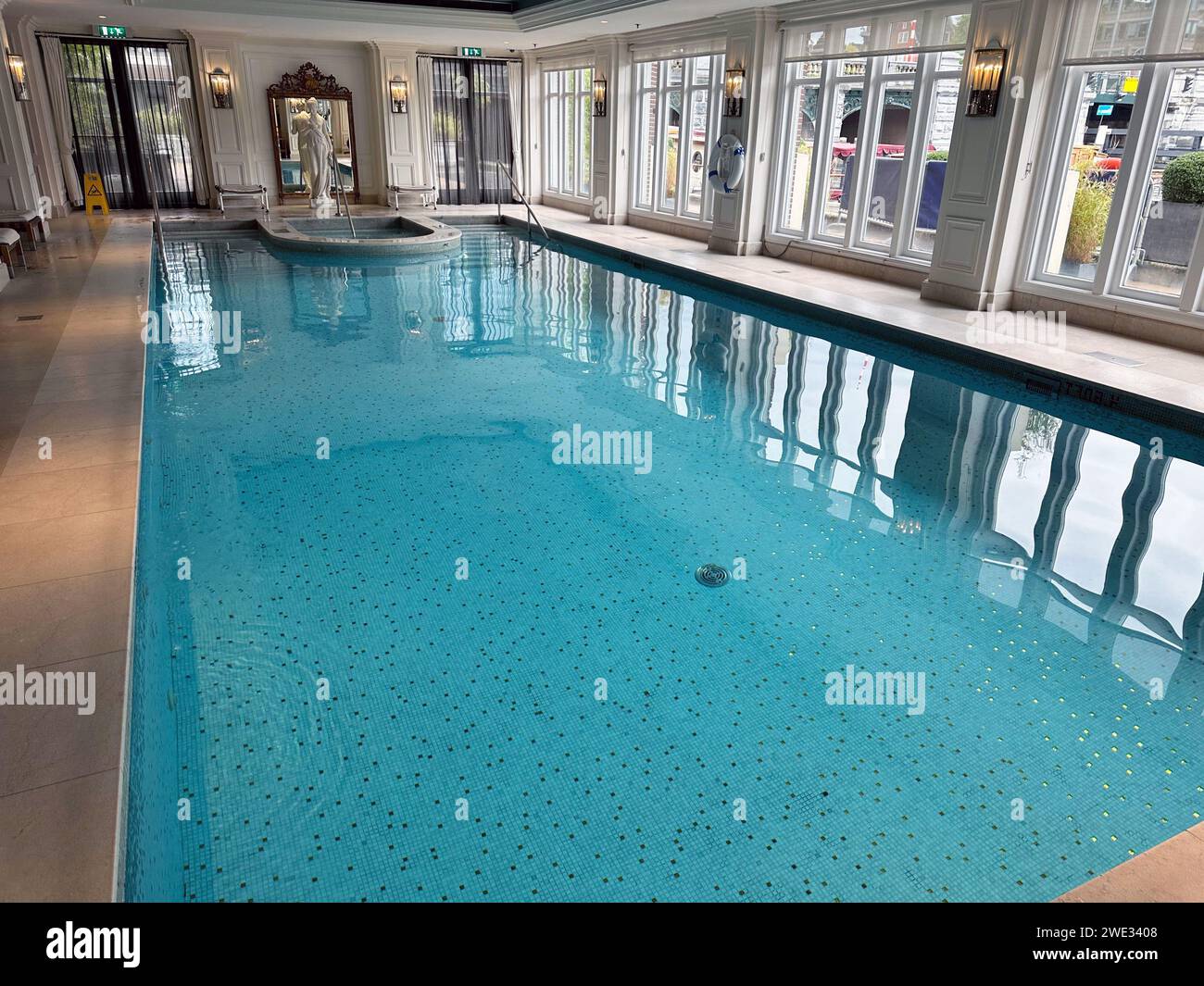 Luxury swimming pool with clean water in hotel Stock Photo - Alamy