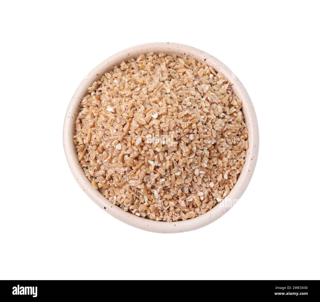 Dry wheat groats in bowl isolated on white, top view Stock Photo - Alamy