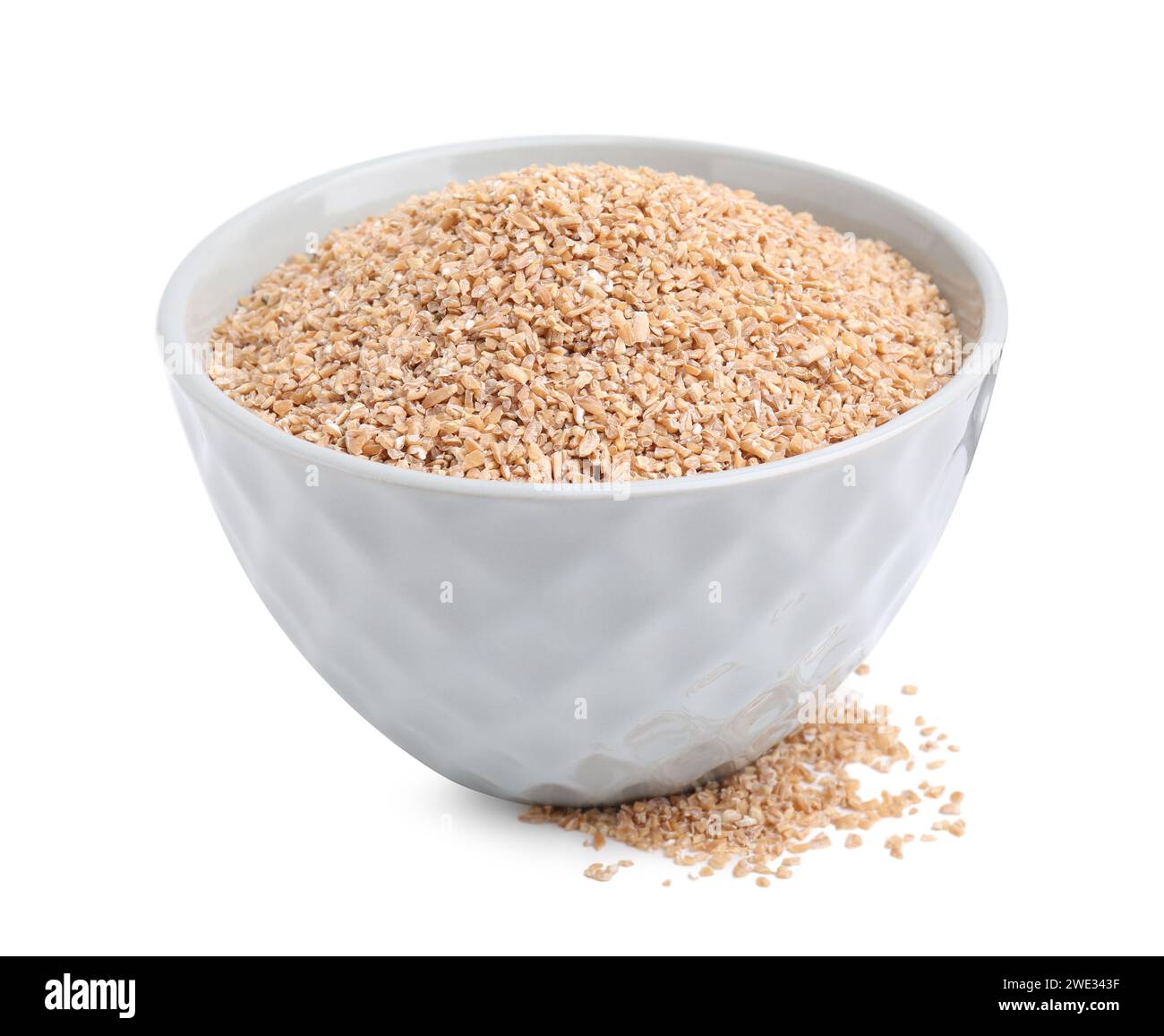 Dry wheat groats in bowl isolated on white Stock Photo - Alamy