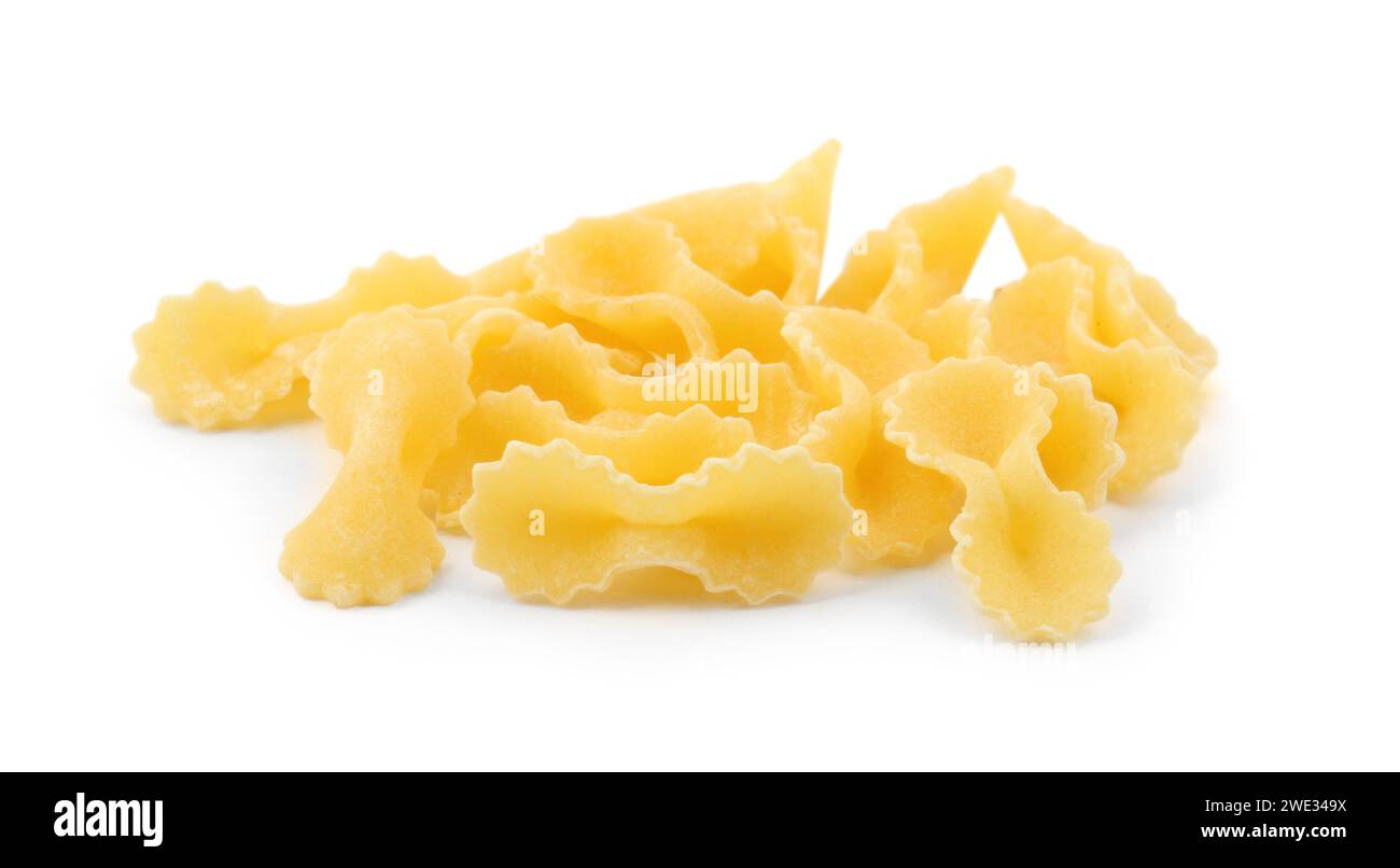Pile of raw farfalline pasta isolated on white Stock Photo - Alamy