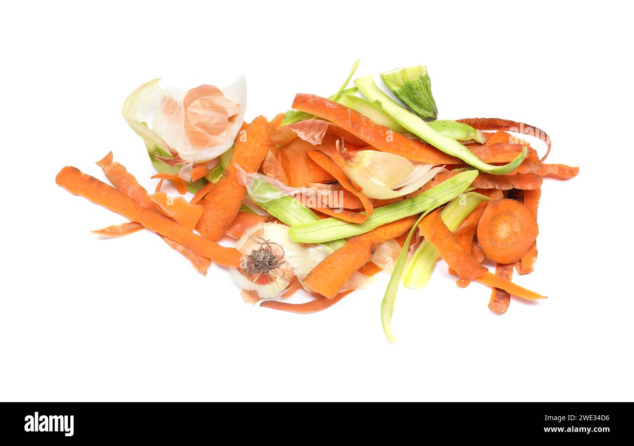Peels of fresh vegetables isolated on white Stock Photo - Alamy