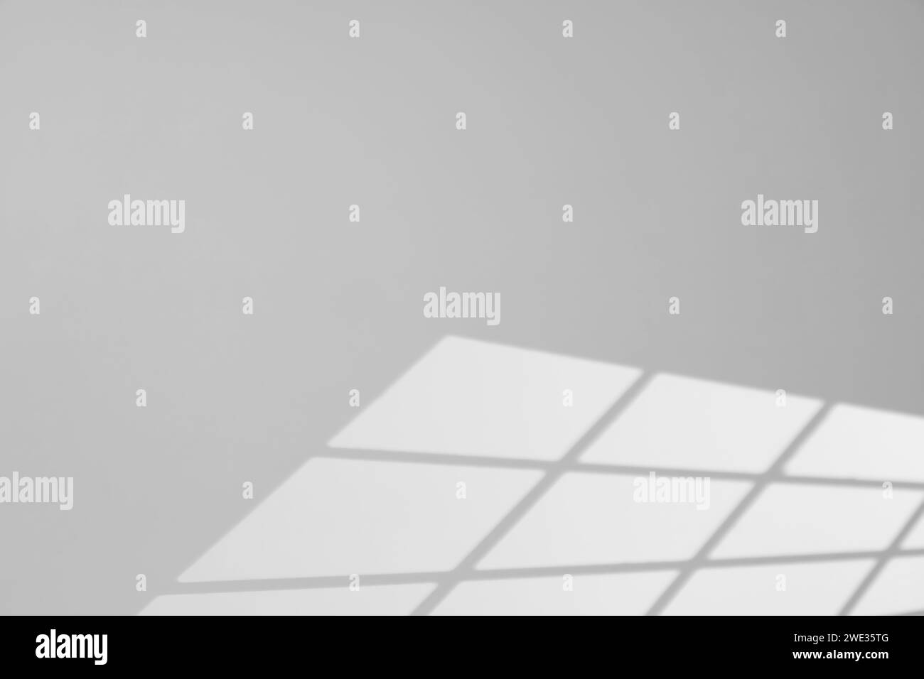 Light and shadow from window on white wall, space for text Stock Photo ...