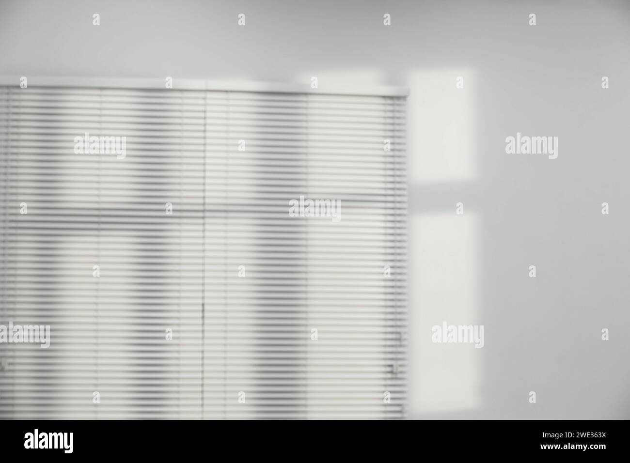 Light and shadows from window on wall indoors Stock Photo - Alamy