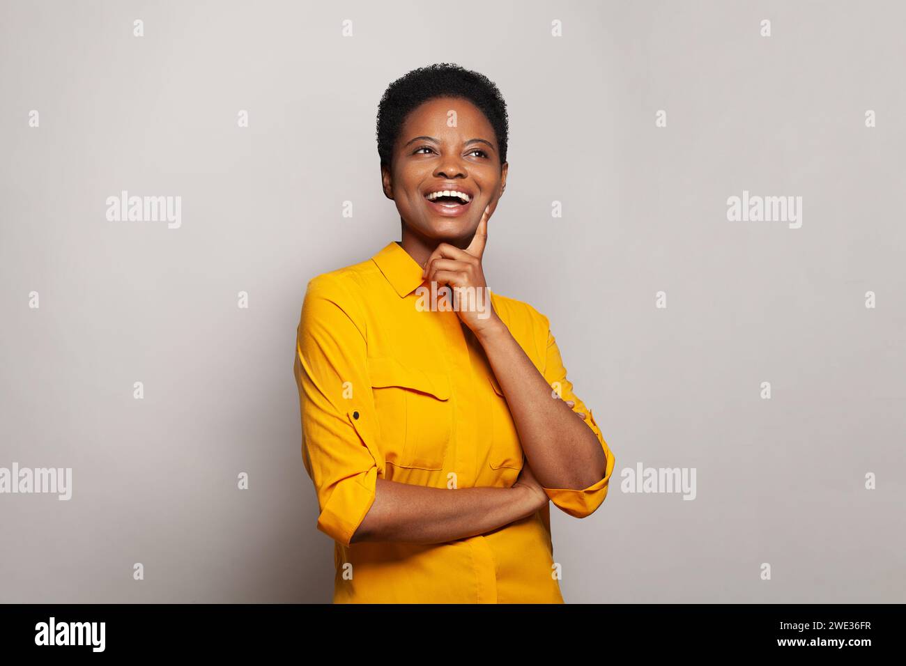 Joyful shocked woman. Young emotional model, studio portrait. Surprise ...