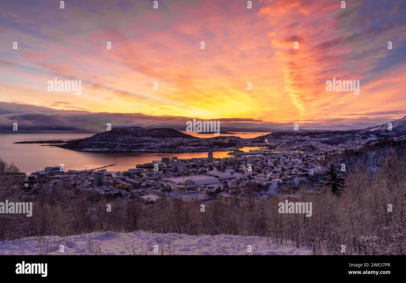 A scenic view of the sunrise over the arctic town of Harstad in Norway ...