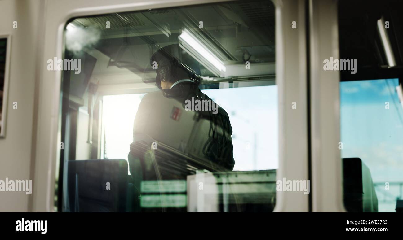Train, conductor and window or transportation for travel Japan, control ...