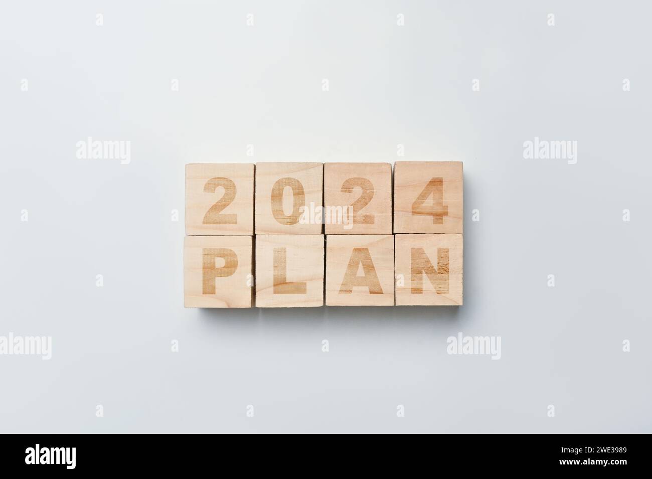 Wooden cube blocks with 2024 PLAN word on white background. Business ...