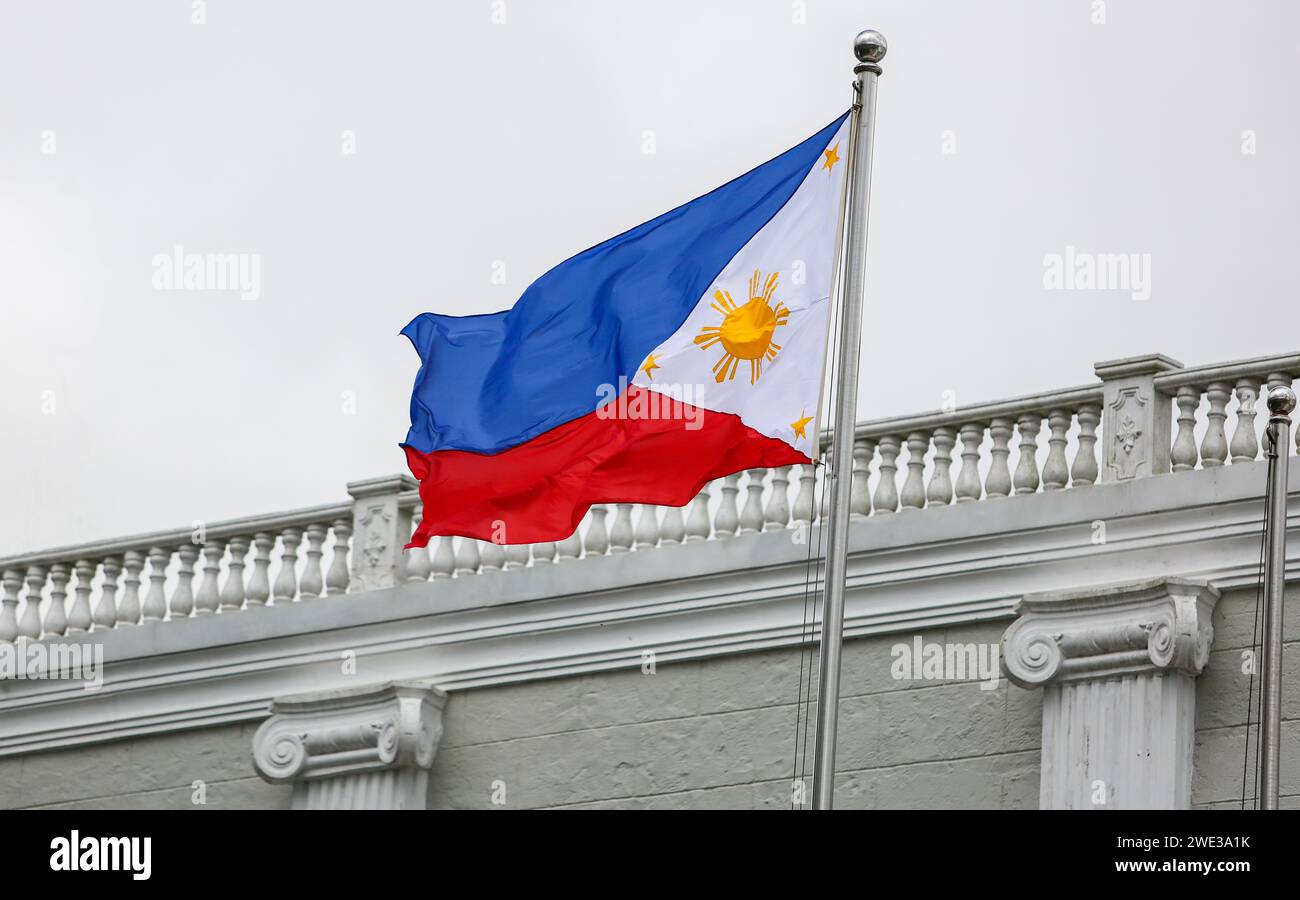 Philippine flag, Philippines national symbol waving in front of ...