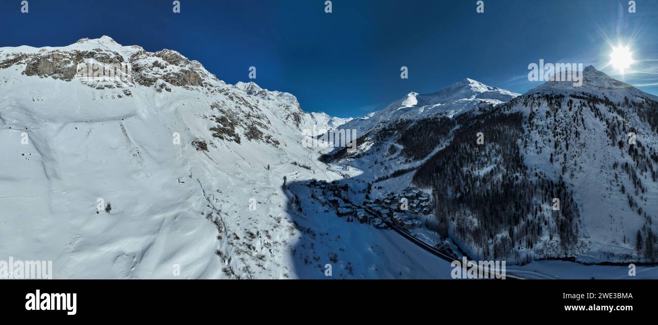 Winter drone shot of ski pistes and slopes covered with fresh powder ...