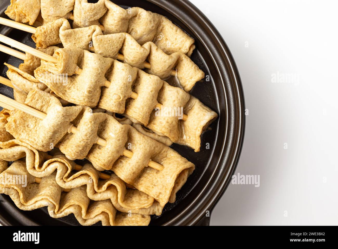 Skewered fish cake on white background Stock Photo - Alamy