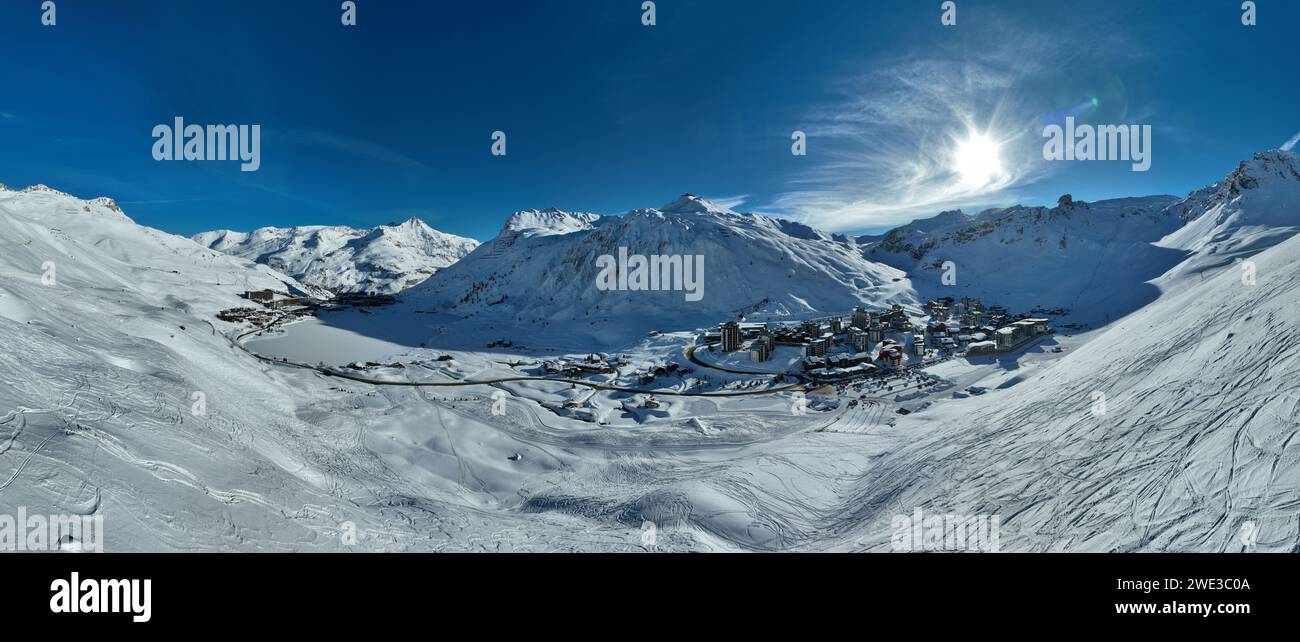 Winter drone shot of ski pistes and slopes covered with fresh powder ...
