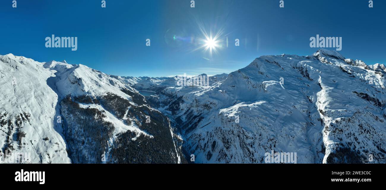 Winter drone shot of ski pistes and slopes covered with fresh powder ...
