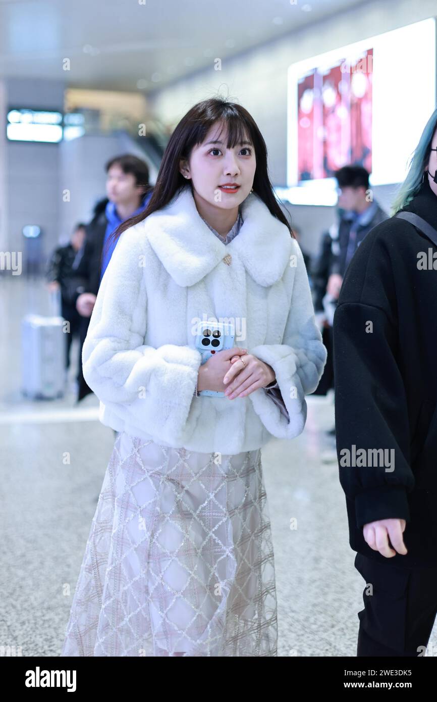 Chinese idol singer and actress Li Yitong appears at the airport in ...