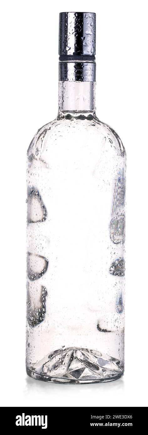 The Glass bottle of vodka with drops isolated on white background with ...