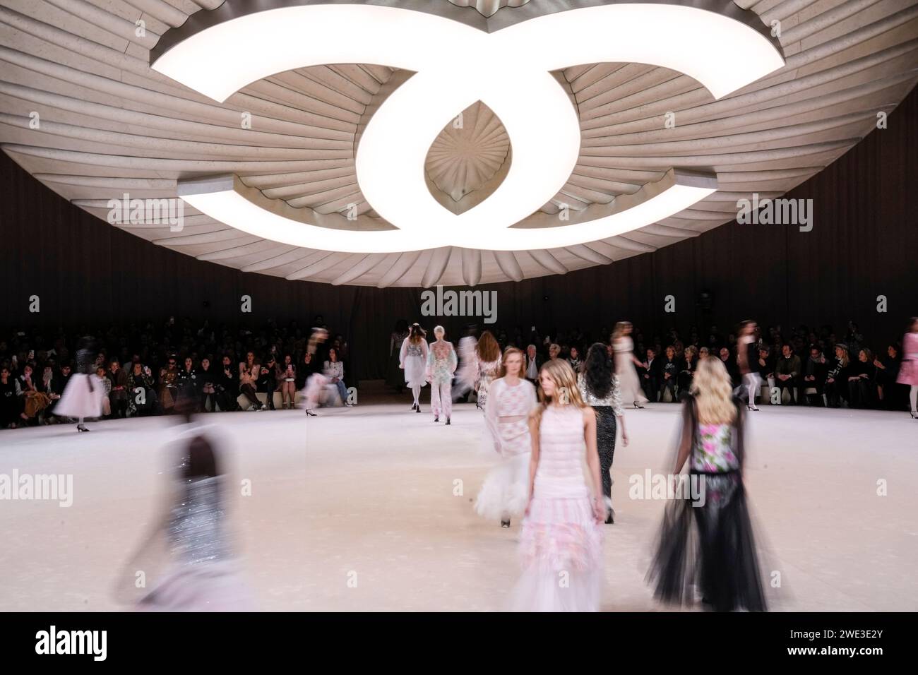 Models wear creations for Chanel as part of the Haute Couture Spring ...