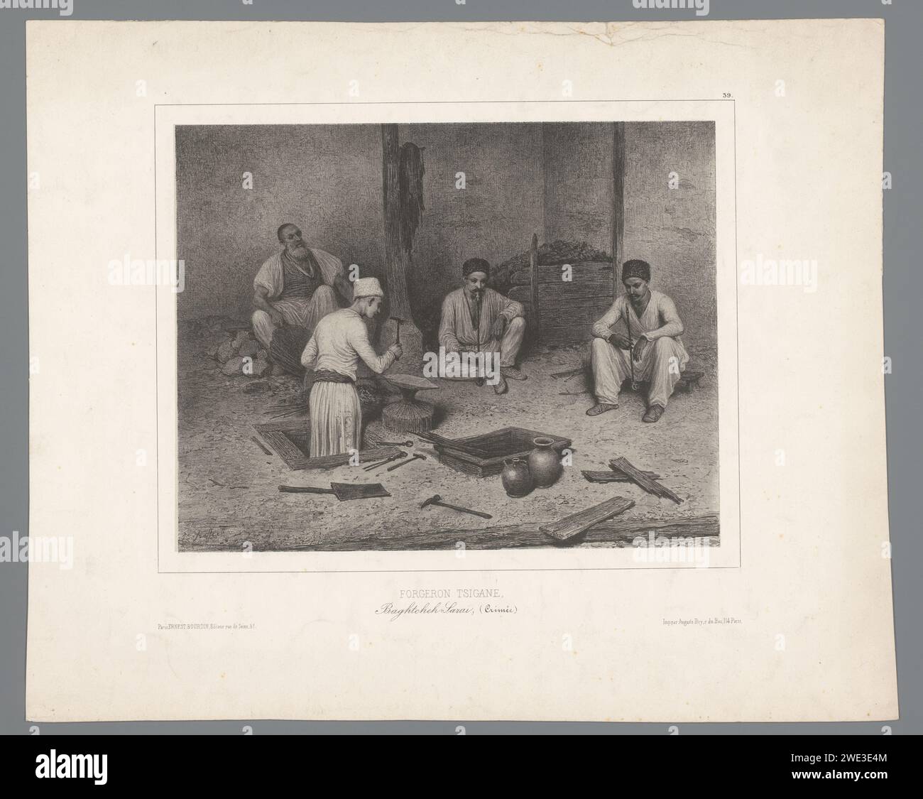 A blacksmith and an employee with a wind ball at work, two men smoke ...