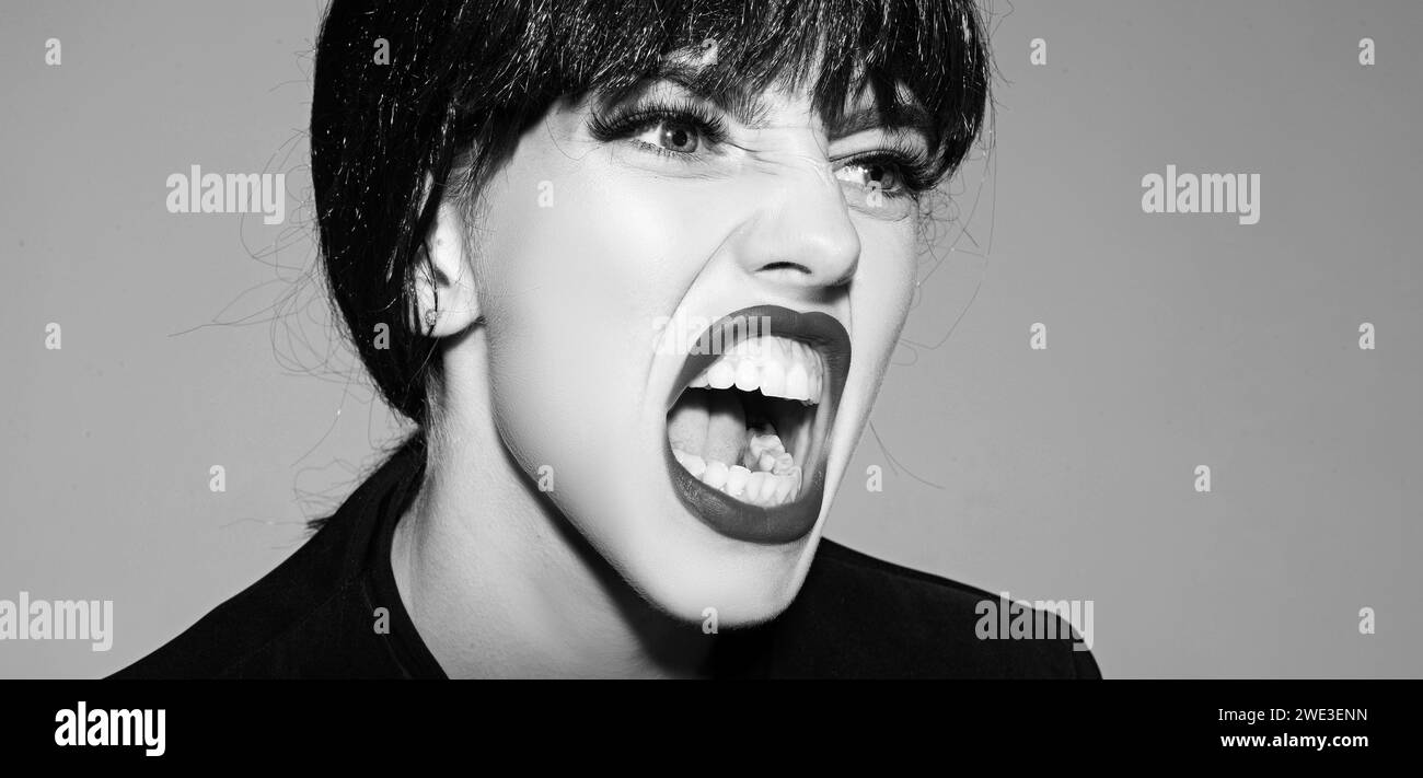 Woman shouting and screaming loud with open mouth. Human emotions ...