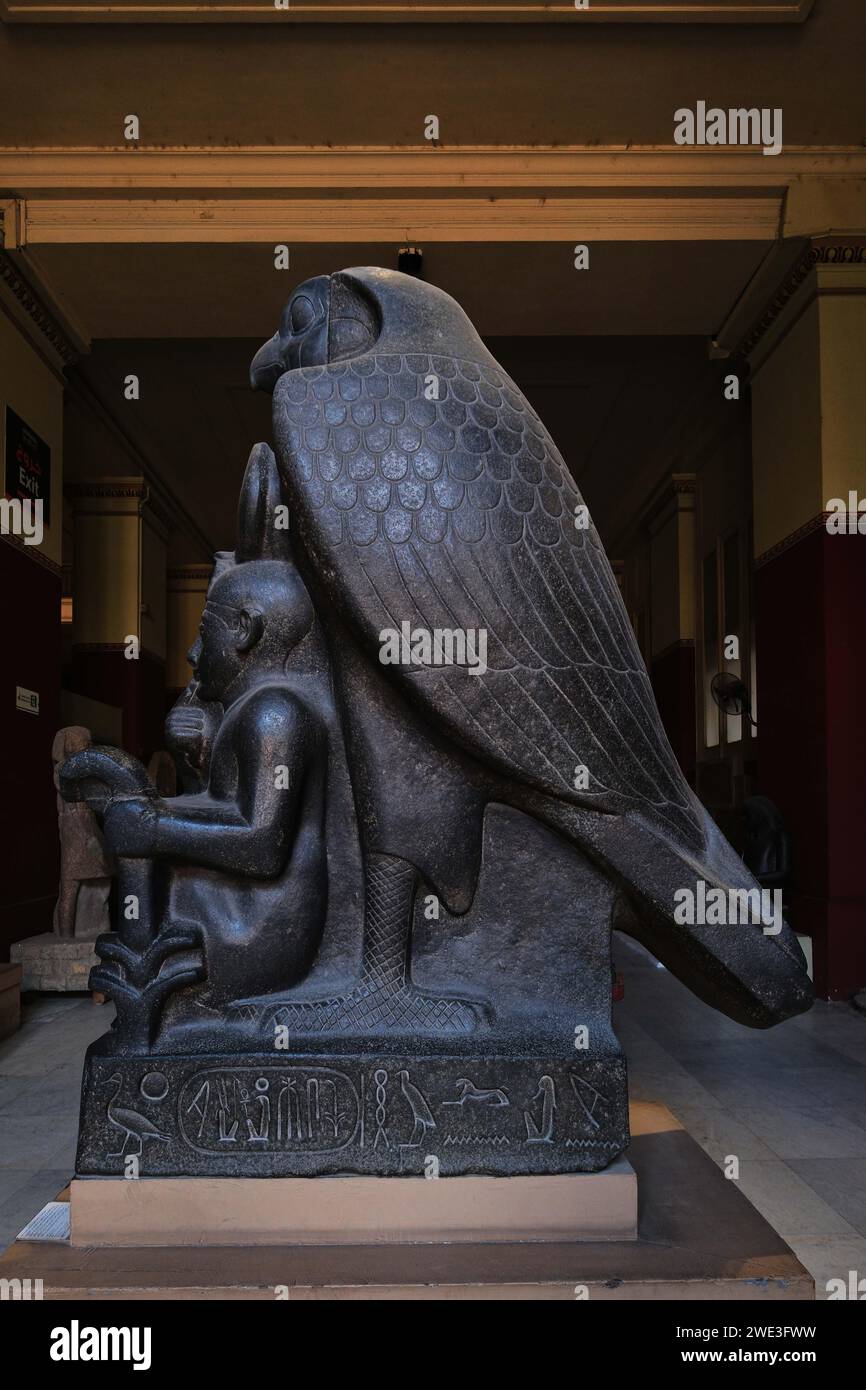 Cairo, Egypt - January 2, 2024: Statue of young Ramses II and God Horus ...