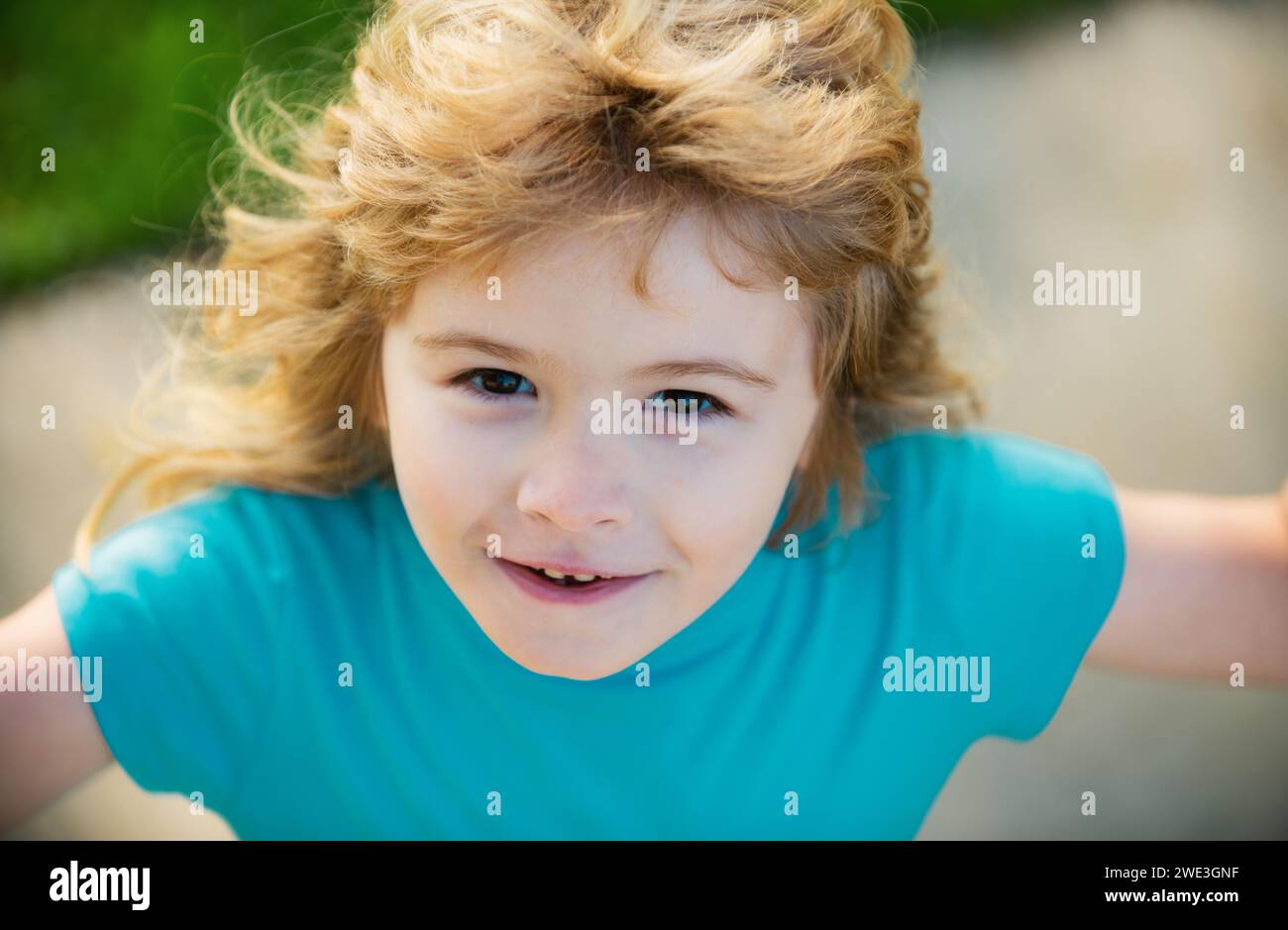 Kids face close up. Funny blonde little child close up portrait. Happy ...