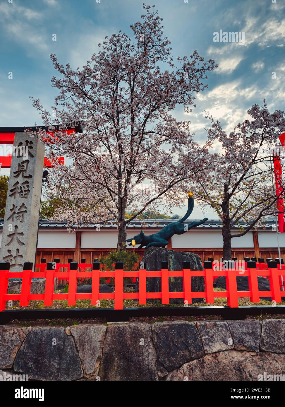 Red structures and vivid trees in the Japanese spring days Stock Photo ...