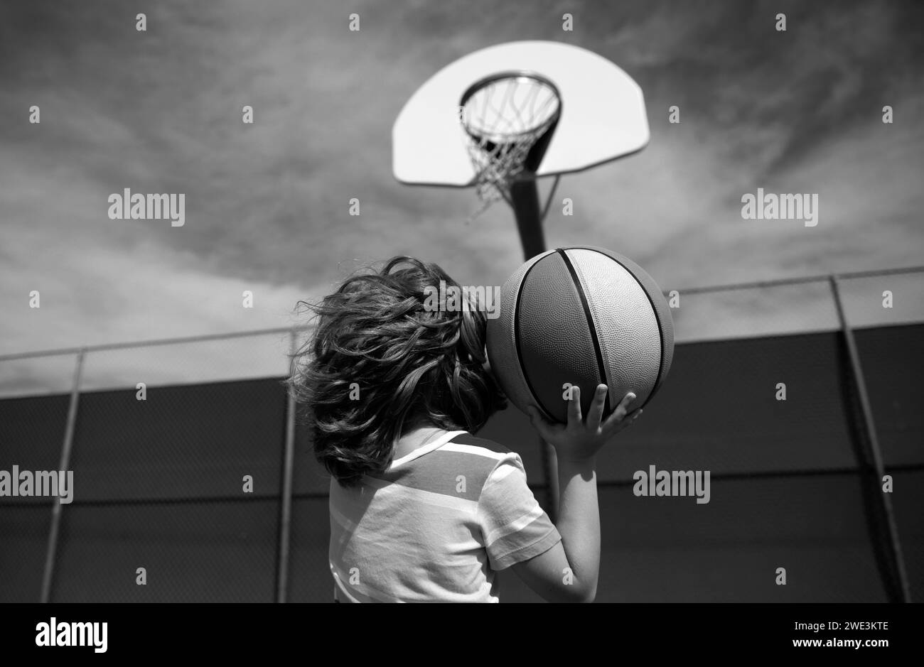 Little child boy playing basketball with basket ball. Basketball kids ...