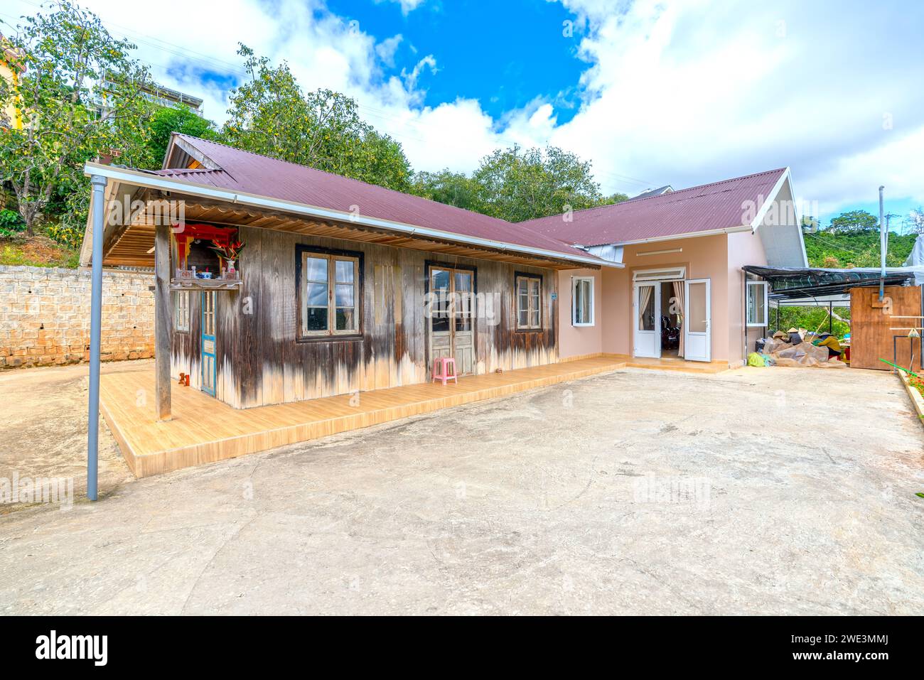 A old small wooden house in the suburbs Da Lat, Vietnam. Place of eco ...