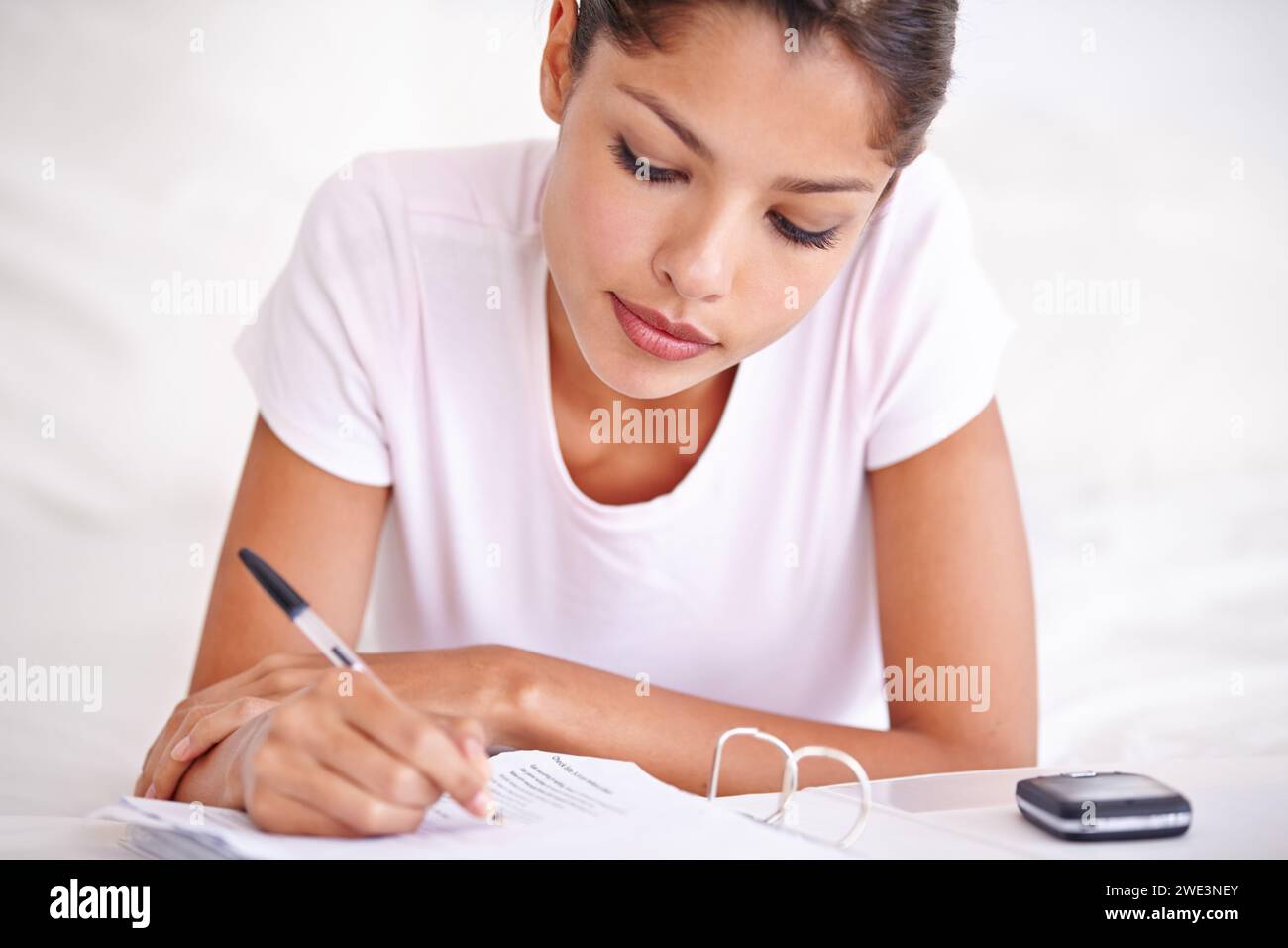 Woman, writer and planning in journal, writing ideas and inspiration or ...