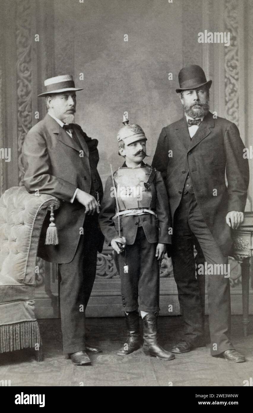 Two German men and a young boy in a Berlin studio Stock Photo - Alamy