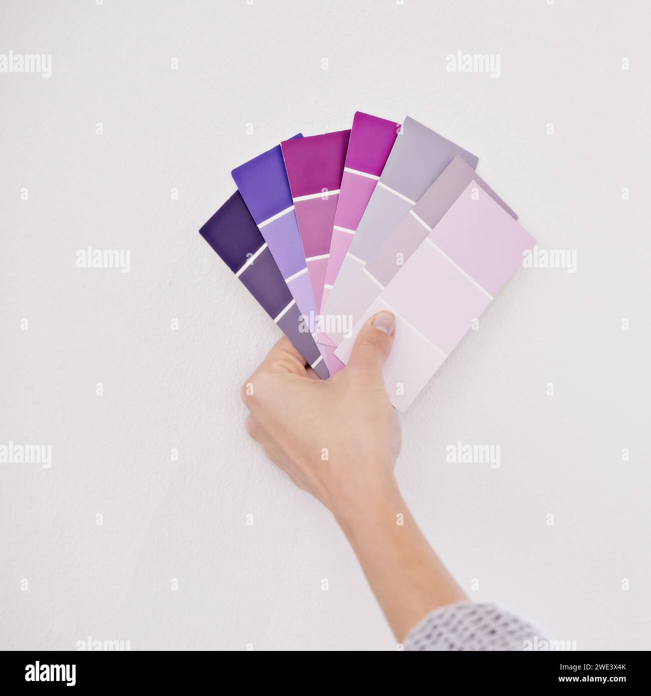 Hand, color swatches for interior design and paint choice, home ...