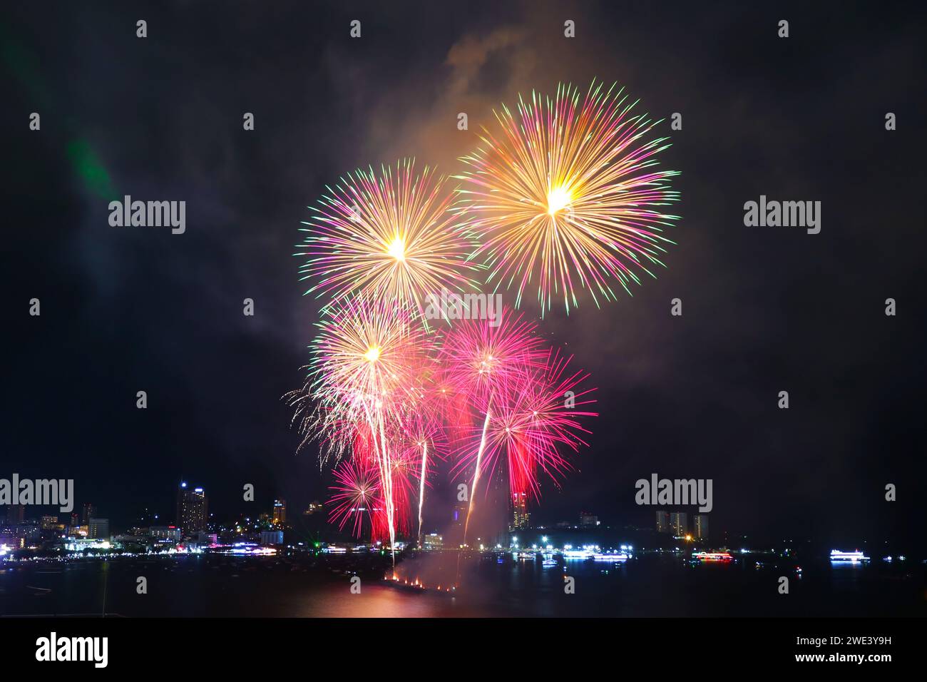 Fantastic multi-color fireworks splashing in the night sky Stock Photo ...