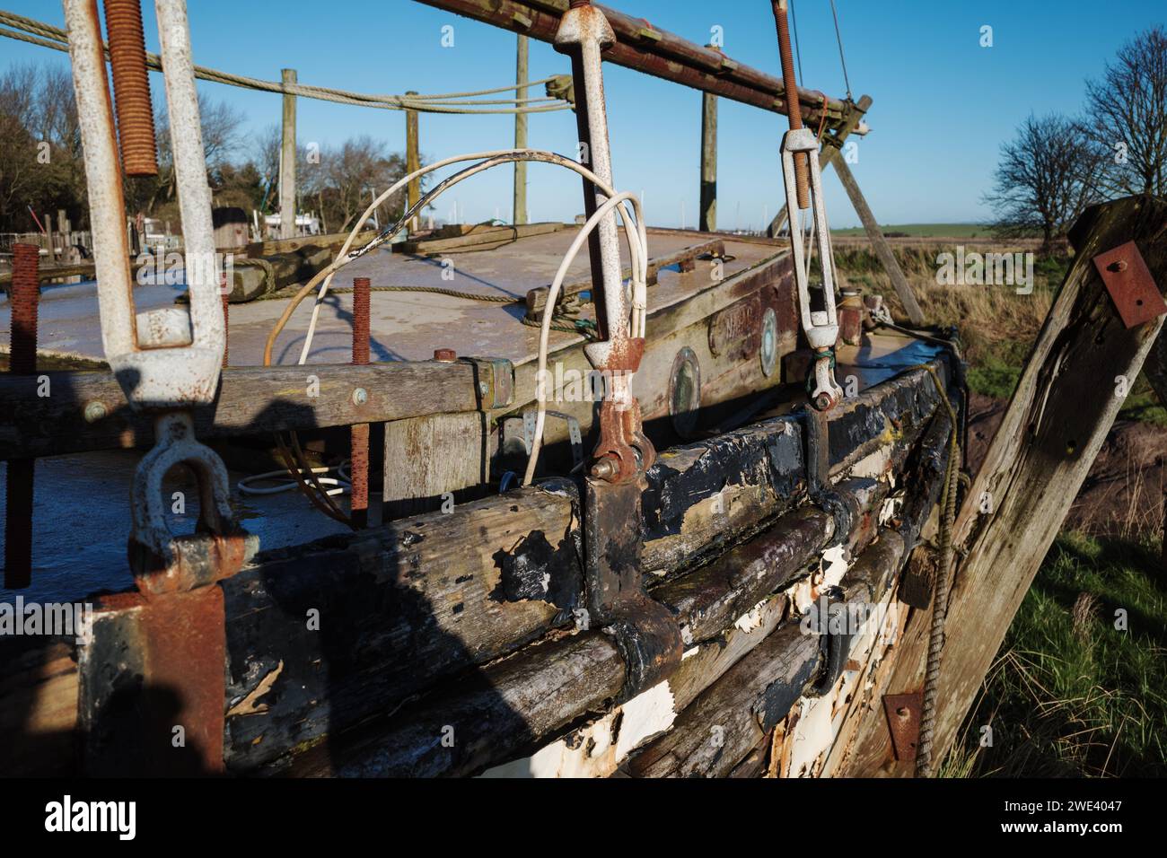 old wooden sail boat slowly rotting away Skippool Creek Stock Photo - Alamy