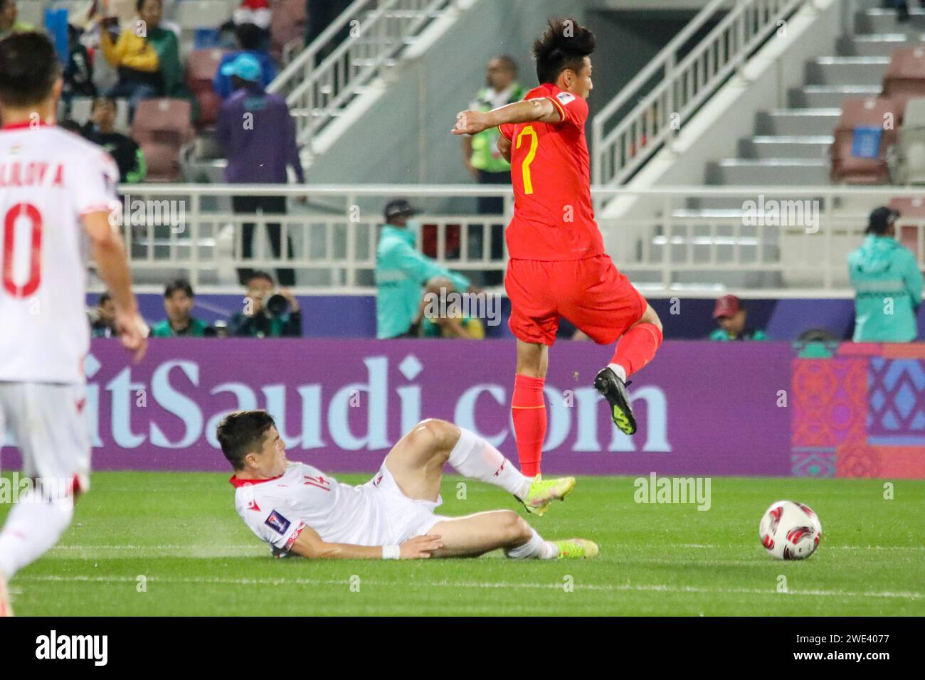 Doha, Qatar. 13th Jan, 2024. Lei Wu of China and Alisher Shukurov of ...