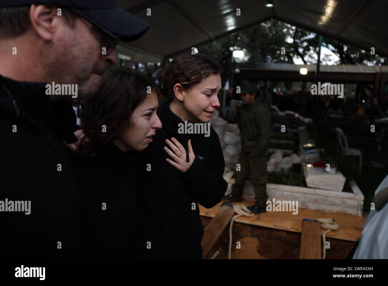 Tel Aviv, Israel. 23rd Jan, 2024. Israelis mourn during the funeral of ...