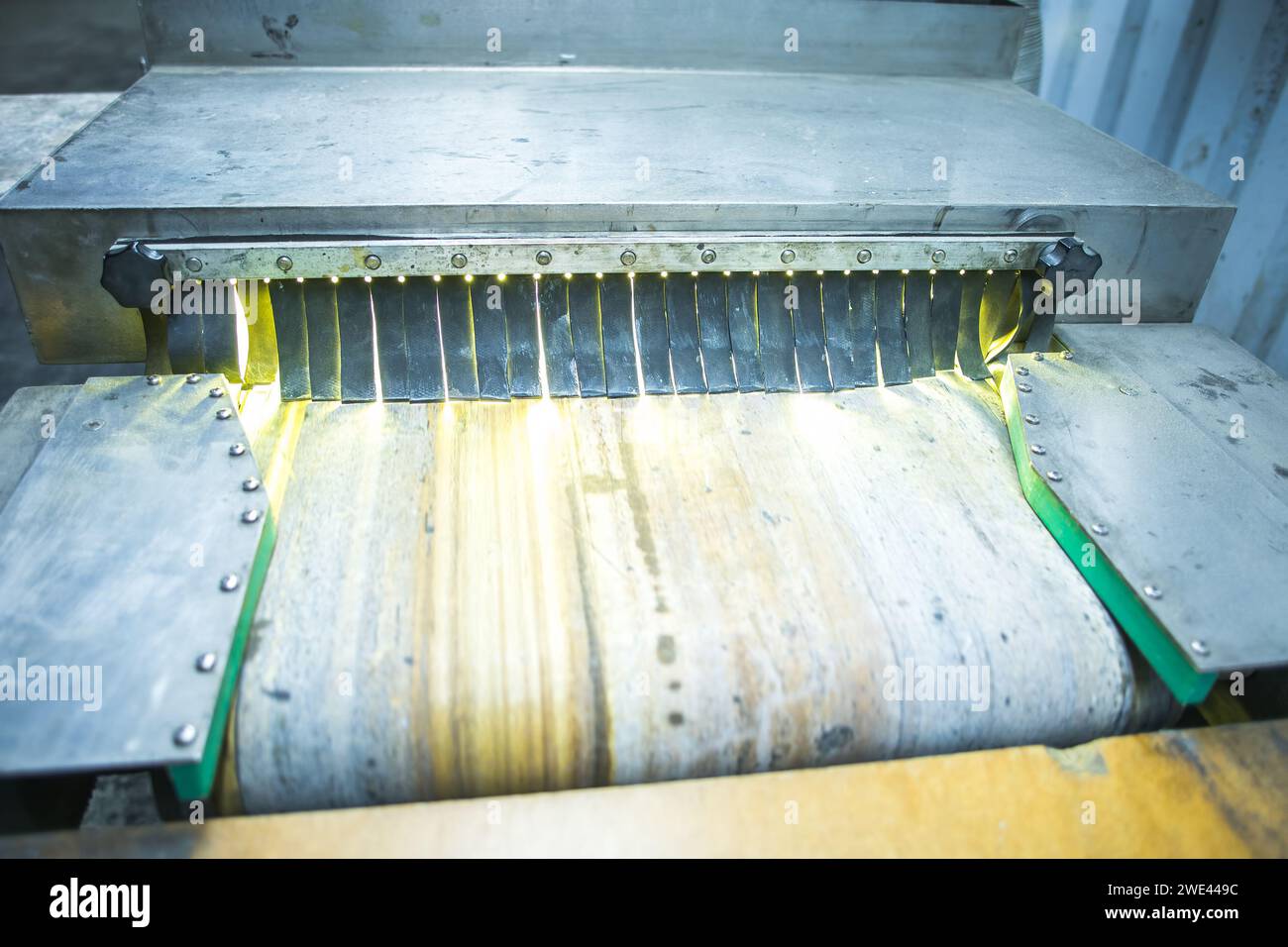 old factory conveyor belt moving Stock Photo - Alamy