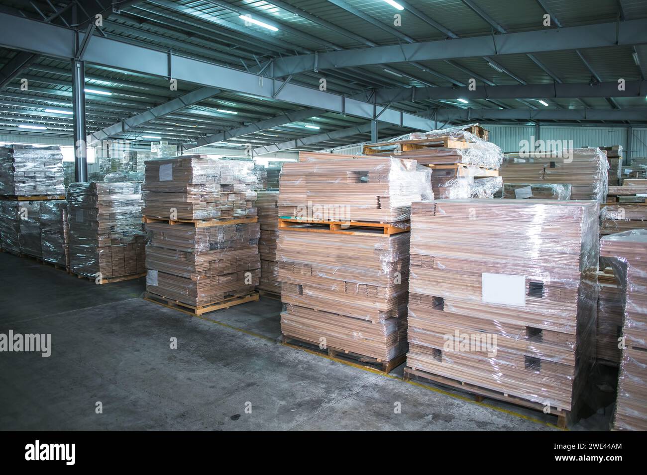 wood factory products stored in warehouse Stock Photo - Alamy