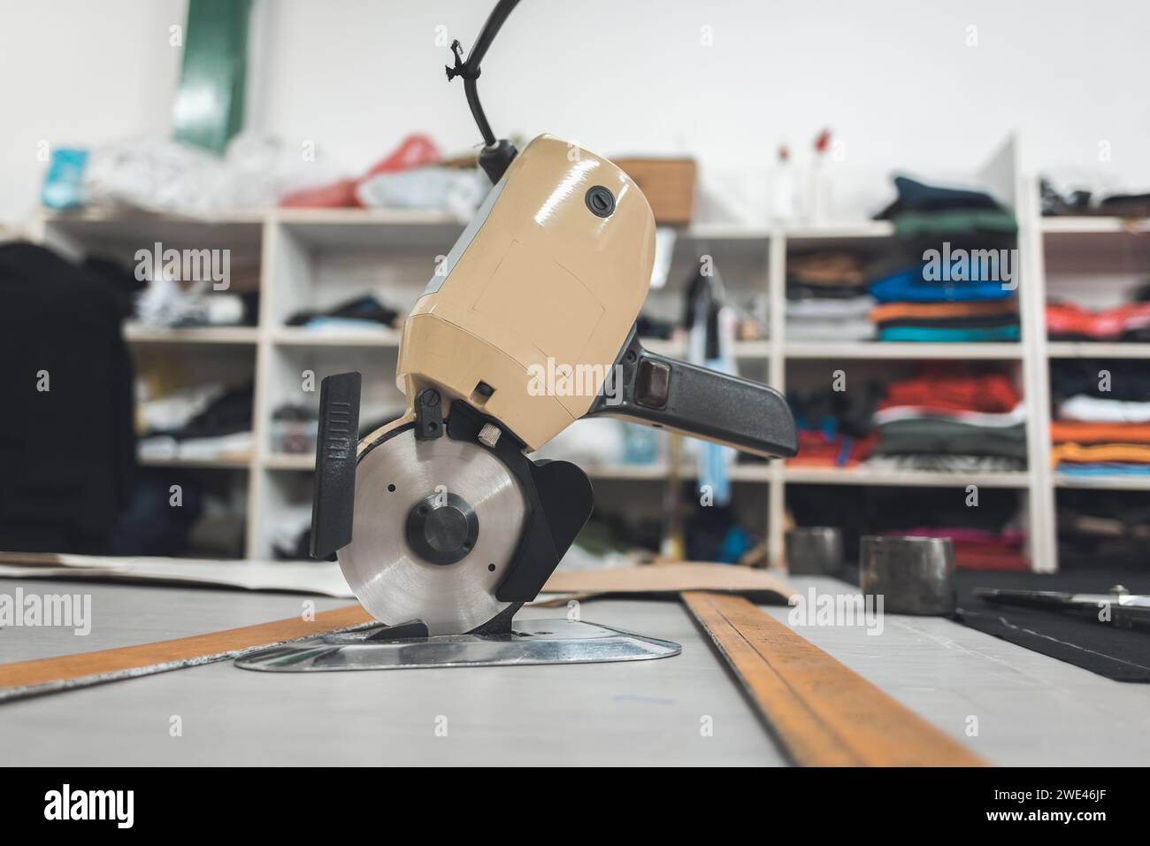 industrial clothing material cutting machine Stock Photo - Alamy