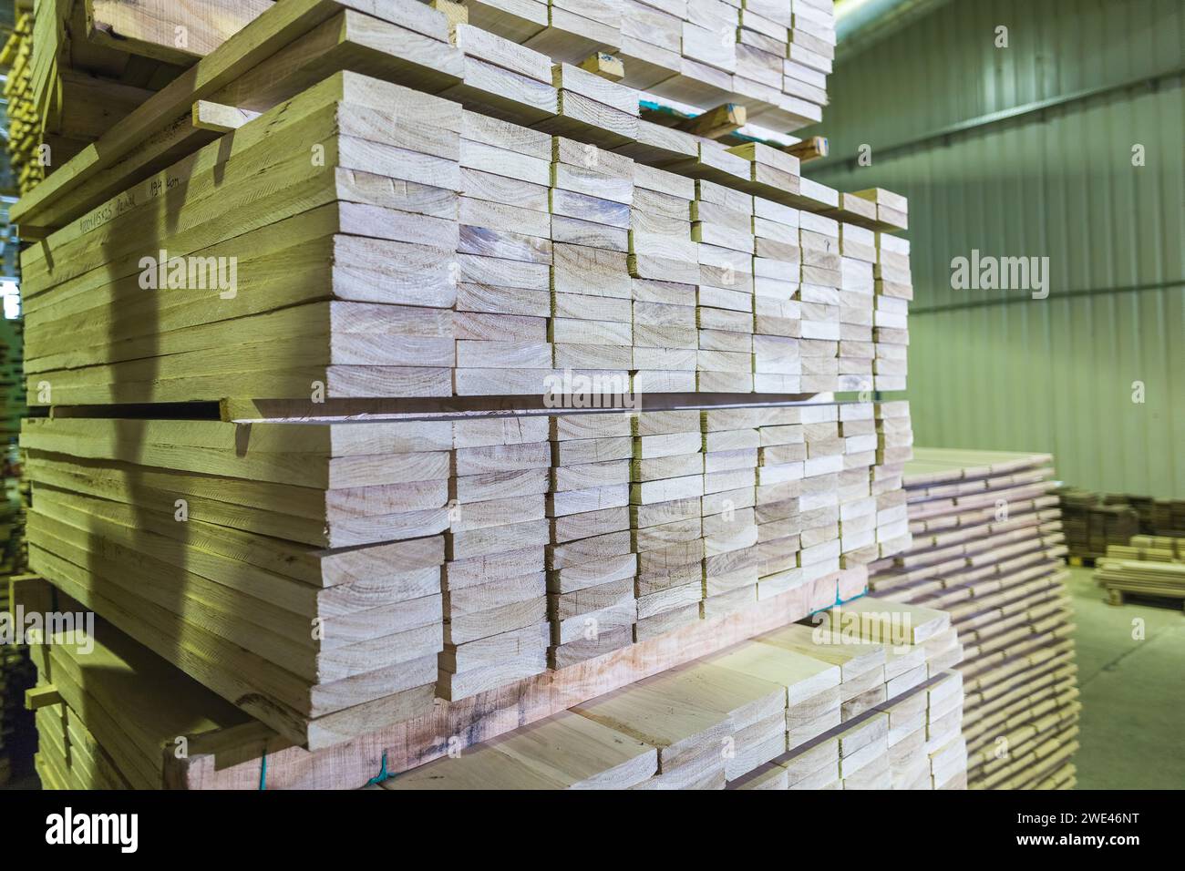 wood flooring planks stored in wood processing factory Stock Photo - Alamy