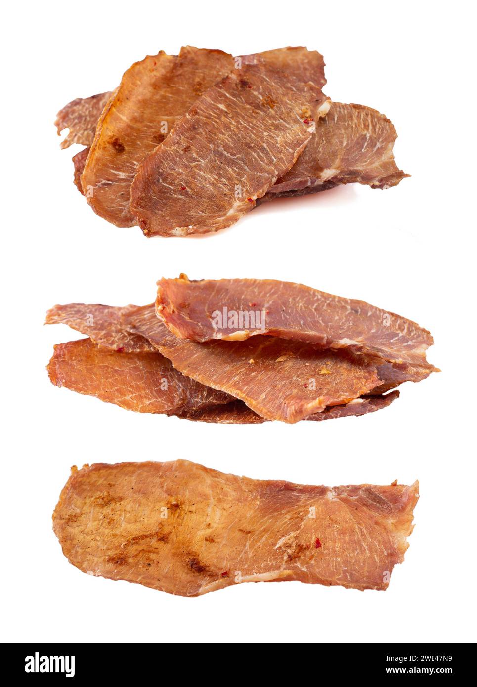 Pieces of cured pork isolated on white background. Portion of dried ...