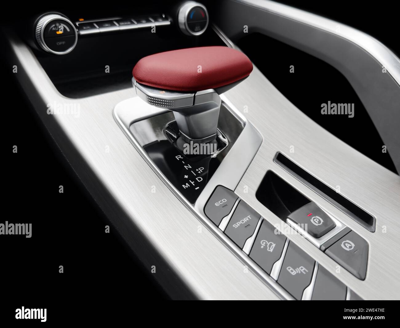 Automatic gear stick of a modern car. Modern car interior details ...